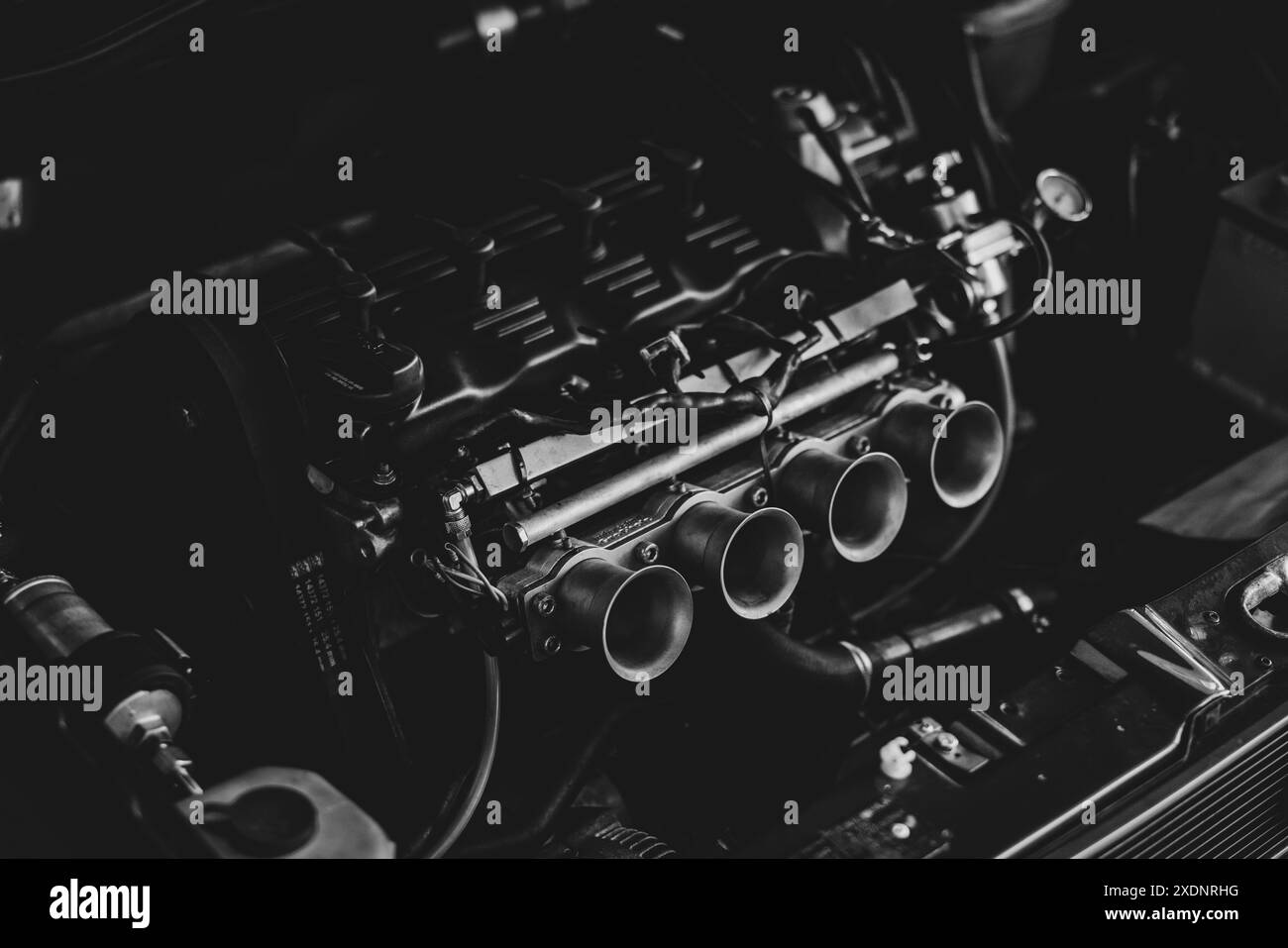 The engine compartment of a VW Golf contains a tuned engine Stock Photo ...
