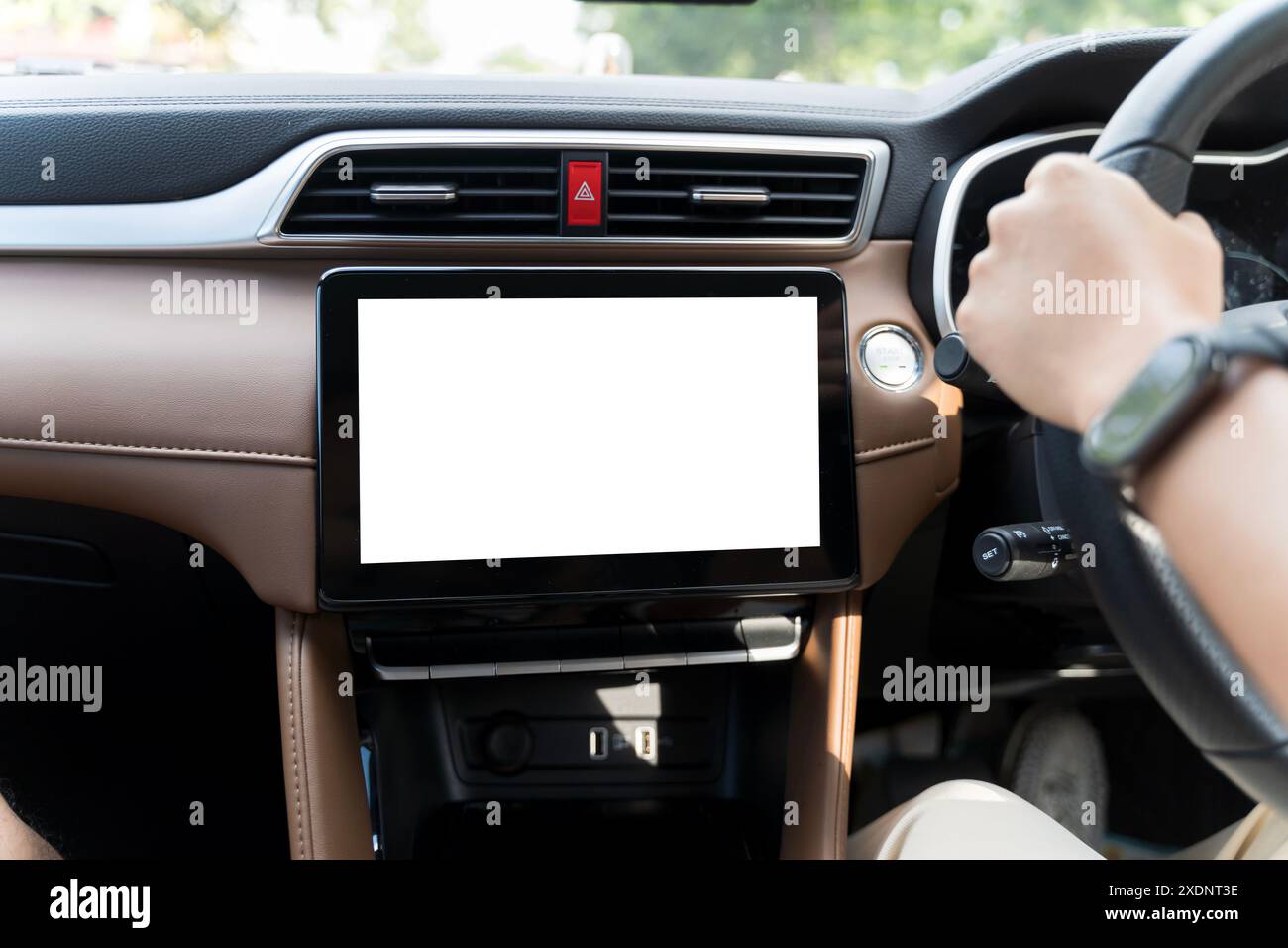 A digital display screen on the dashboard of a modern car. Car ...