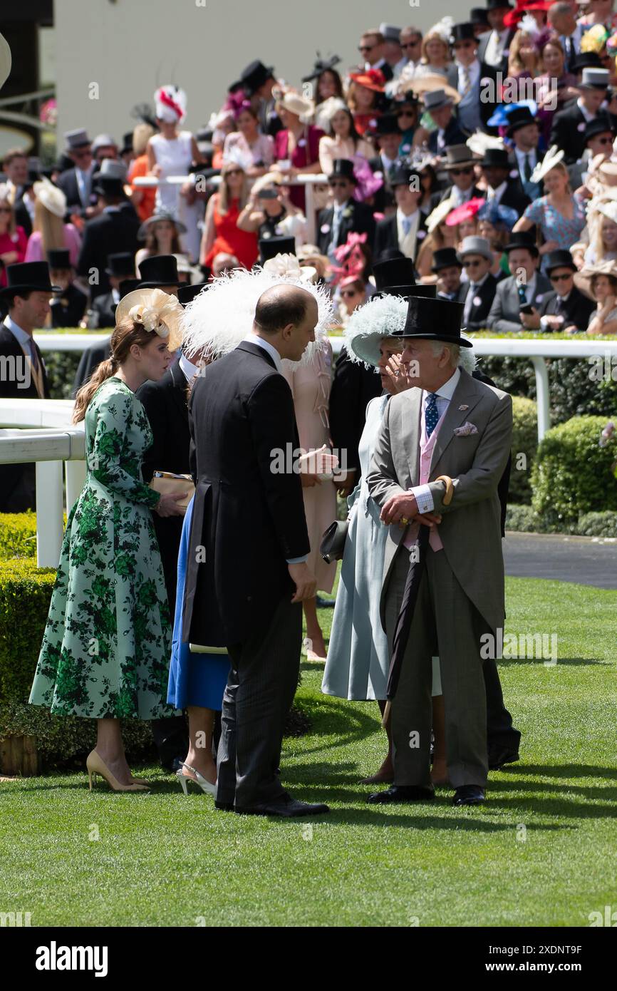 Ascot, UK. 21st June, 2024. The King chats to Lord Frederick Windsor in ...