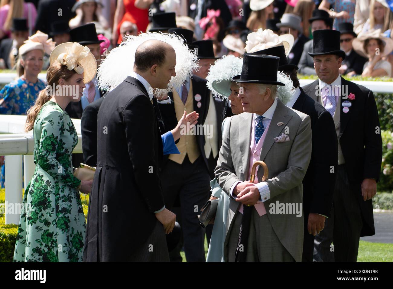 Ascot, UK. 21st June, 2024. The King chats to Lord Frederick Windsor in ...