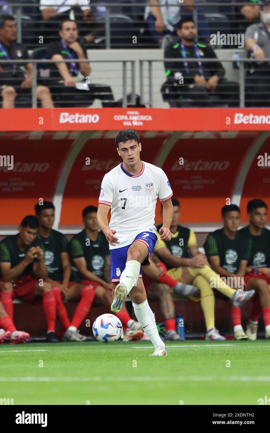 ARLINGTON, TX - JUNE 23: Giovanni Reyna of USA passes the ball during a ...