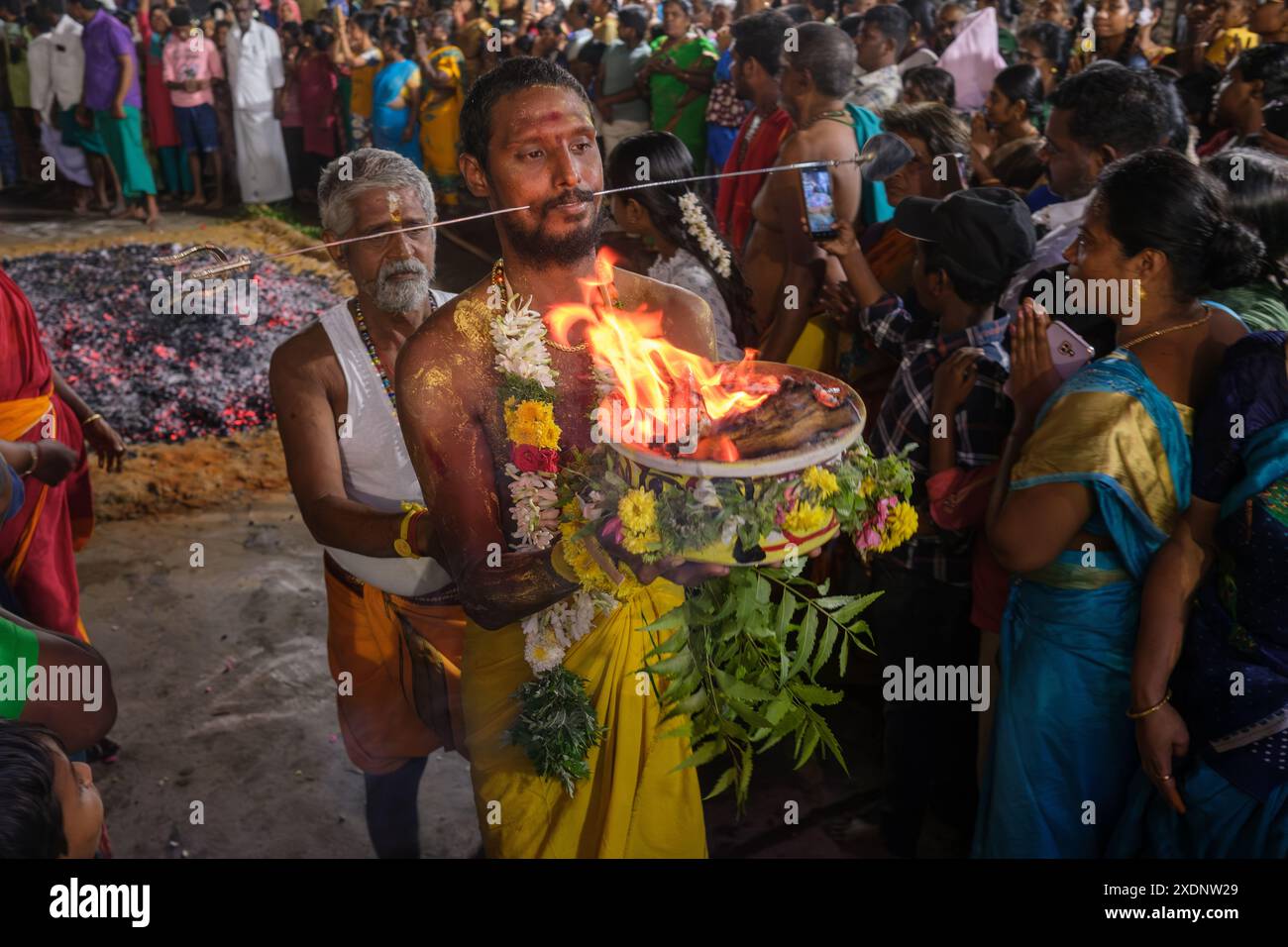 Pilgrims celebrate at a local temple festival in Madurai Stock Photo ...