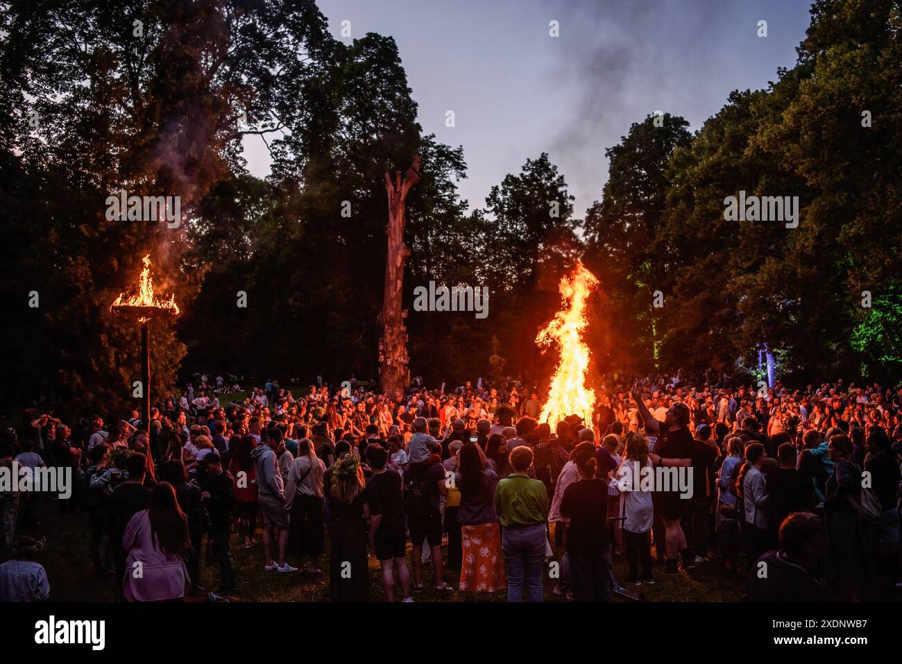 People dance around bonfire as they celebrate the Saint John's Day and ...