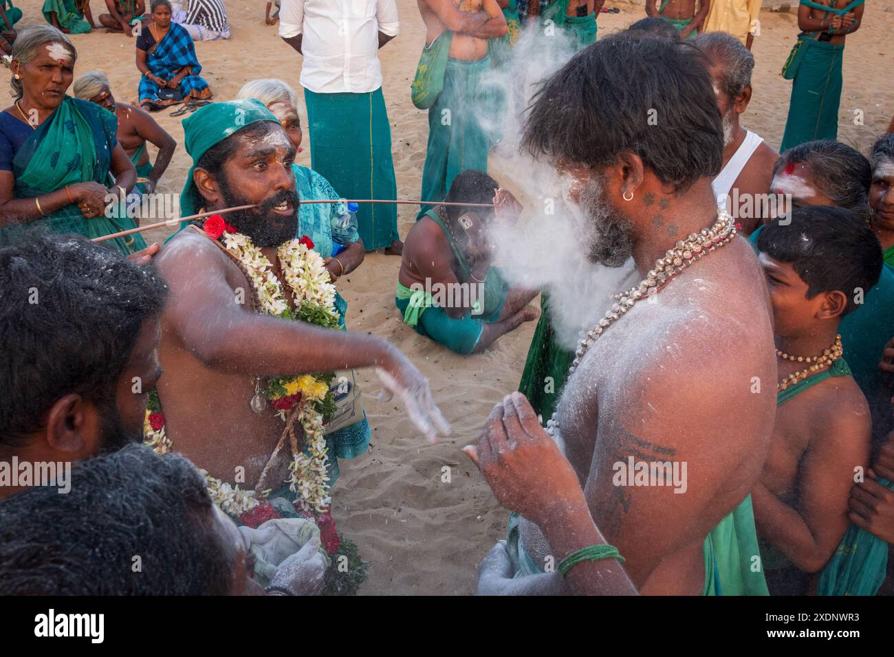 A guru with body piercing celebrates on the beach in Tiruchendur Stock ...