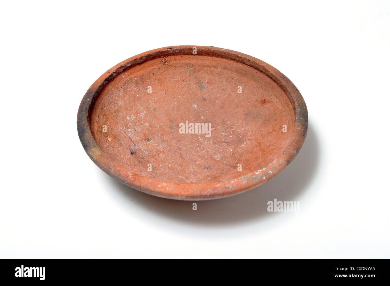 Plate-shaped containers made from clay white background Stock Photo - Alamy