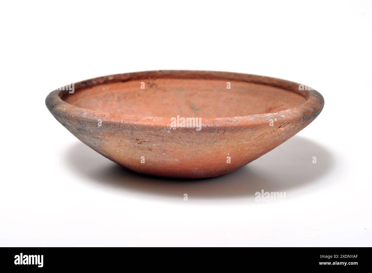 Plate-shaped containers made from clay white background Stock Photo - Alamy
