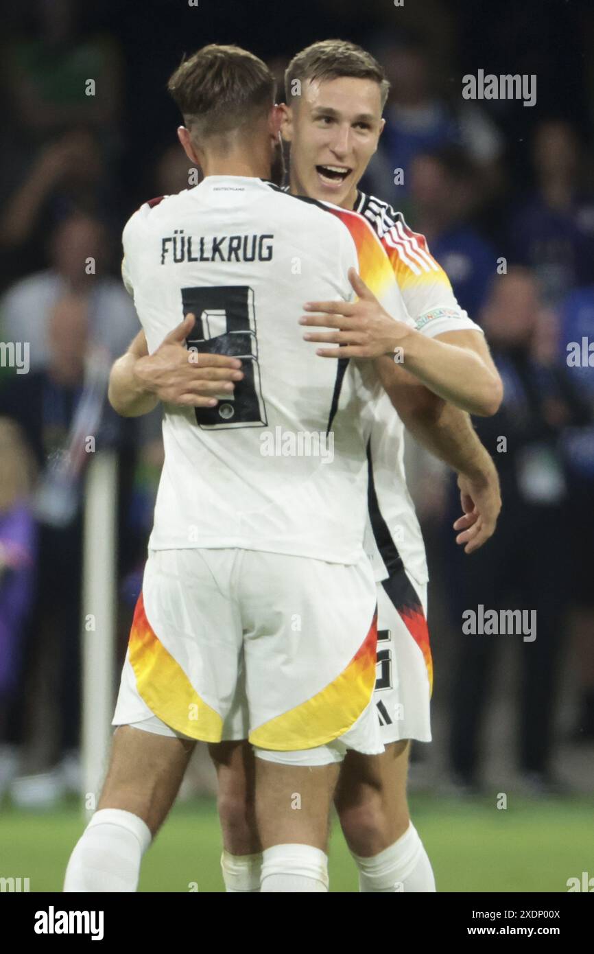Nico Schlotterbeck, left Niclas Fullkrug of Germany celebrate the ...