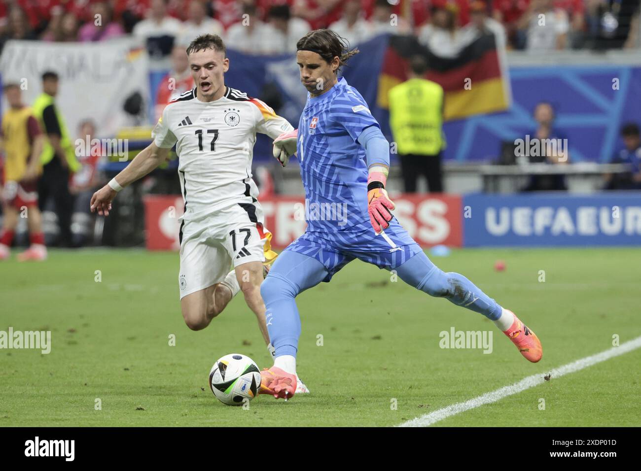 Switzerland goalkeeper Yann Sommer, left Florian Wirtz of Germany ...