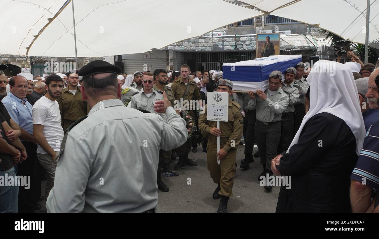 BEIT JAAN, ISRAEL - JUNE 16: Israeli soldiers carry the flag-draped ...