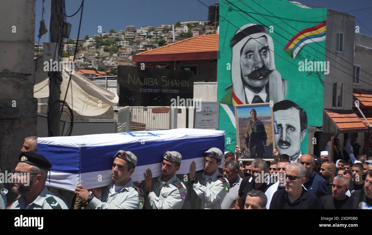 BEIT JAAN, ISRAEL - JUNE 16: Israeli soldiers carry the flag-draped ...