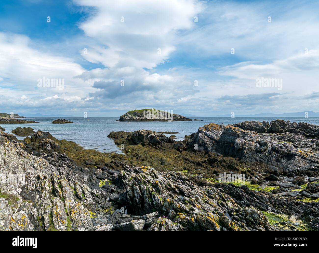 The tiny island of Eilean Olmsa lies just offshore at Port Olmsa on the ...