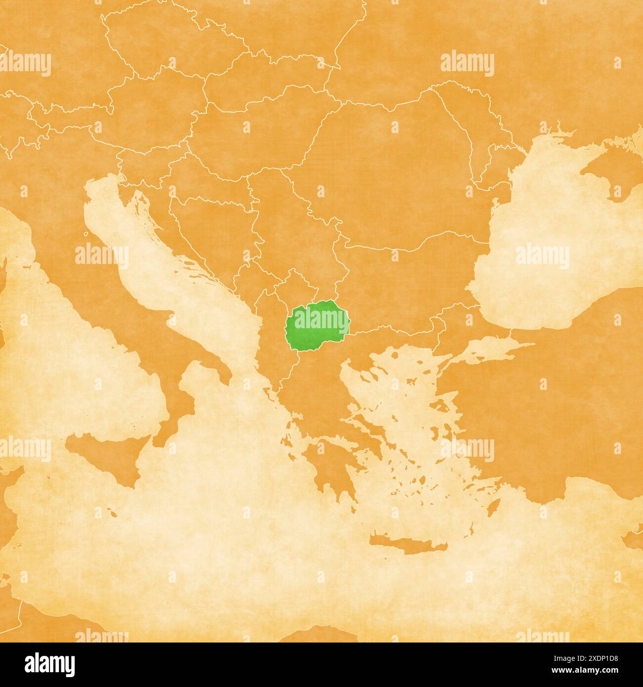 North Macedonia on an ocher retro map of the Balkans on old vintage ...