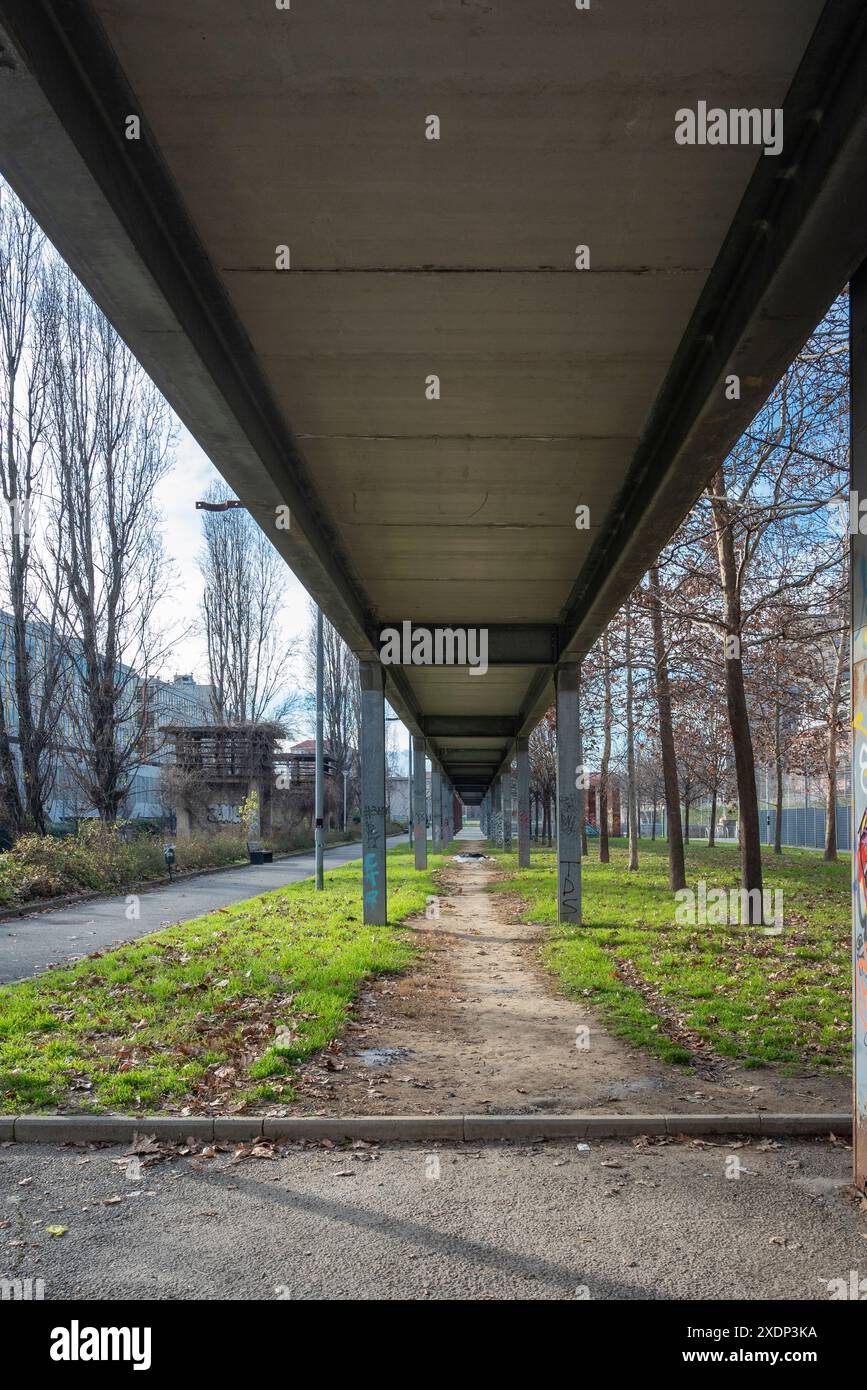 Infinity perspective of pedestrian walkway at Dora park in Turin, Italy ...
