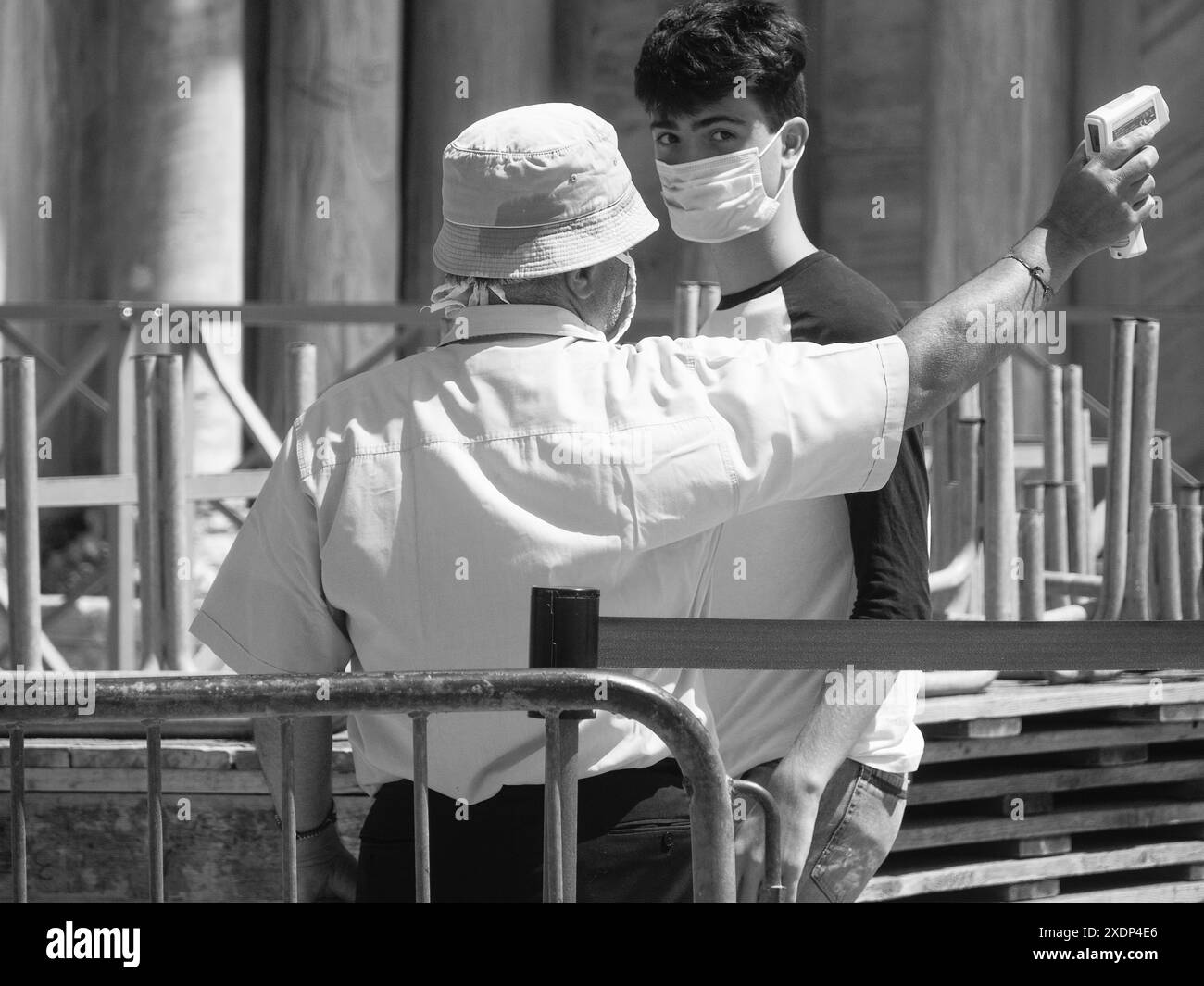 Venice, Italy - June 30th 20220 Security guard pointing digital ...
