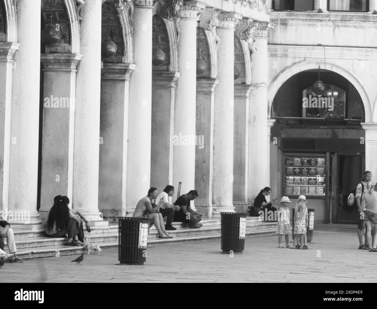 Venice, Italy - June 30th 20220 Tourists and locals relax in the sun in ...