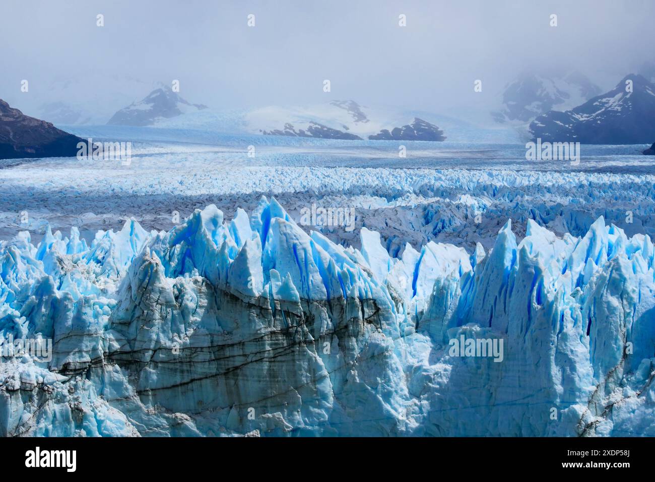 Pointy ice blue edge of the Perito Moreno glacier. Los Glaciares ...