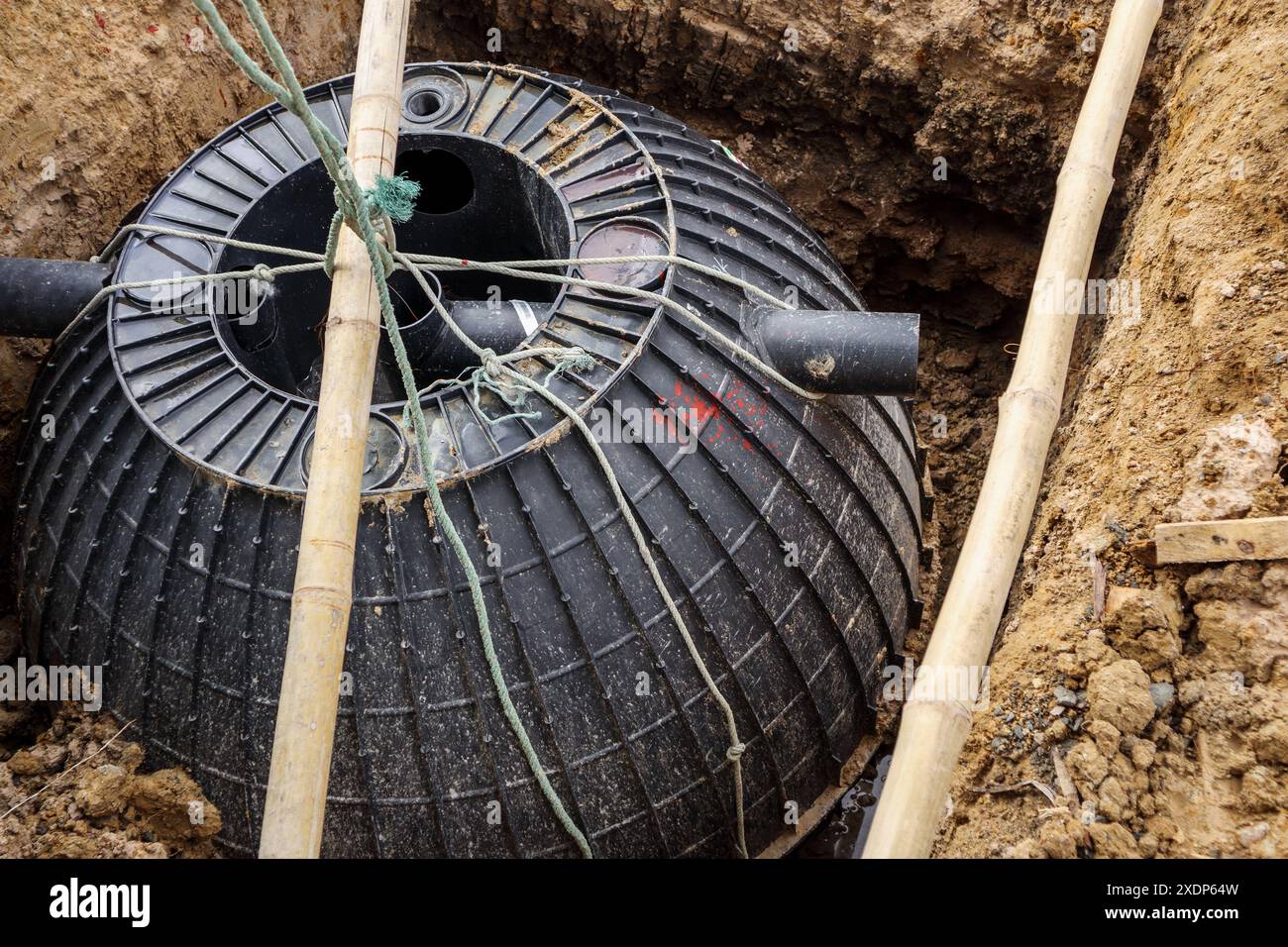 septic tank installation into the ground Stock Photo - Alamy