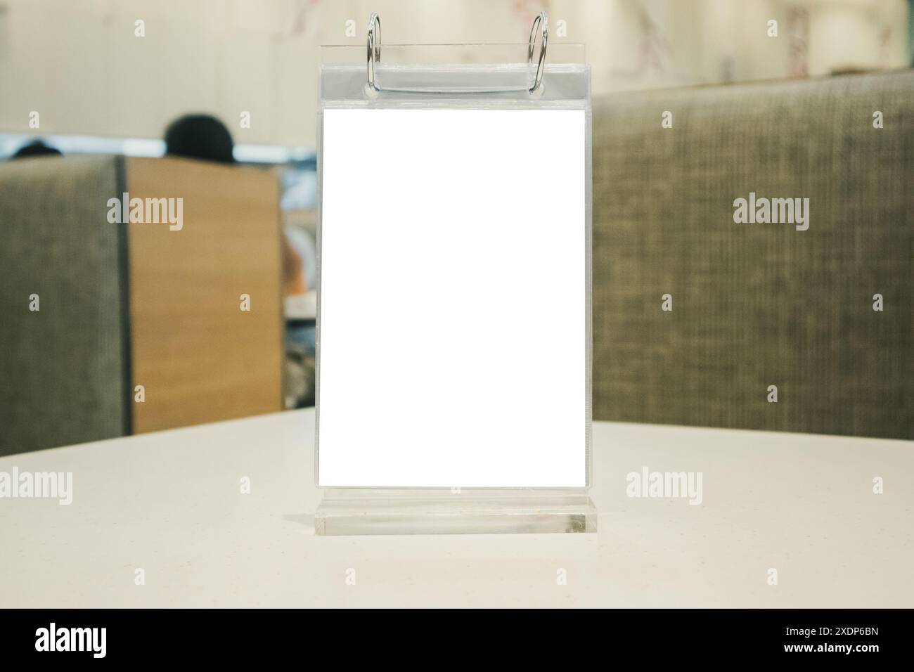 Mockup empty white label menu frame on table with cafe restaurant ...