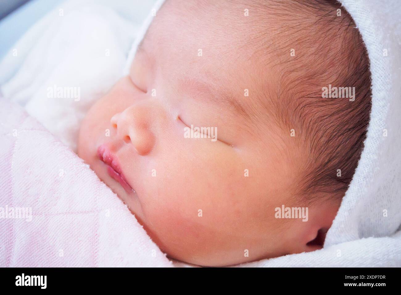 Cute newborn asian baby girl sleeping Stock Photo - Alamy