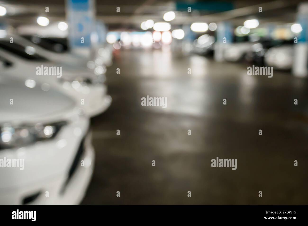 blur many cars in car parking lot inside shopping mall building Stock ...