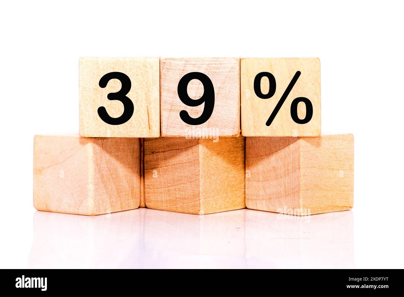 39 percent text on wooden cubes on a white background. Concept photo ...