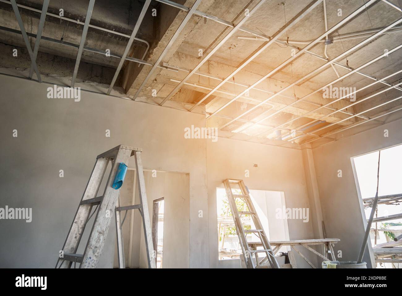 Install metal frame for plaster board ceiling at house under ...