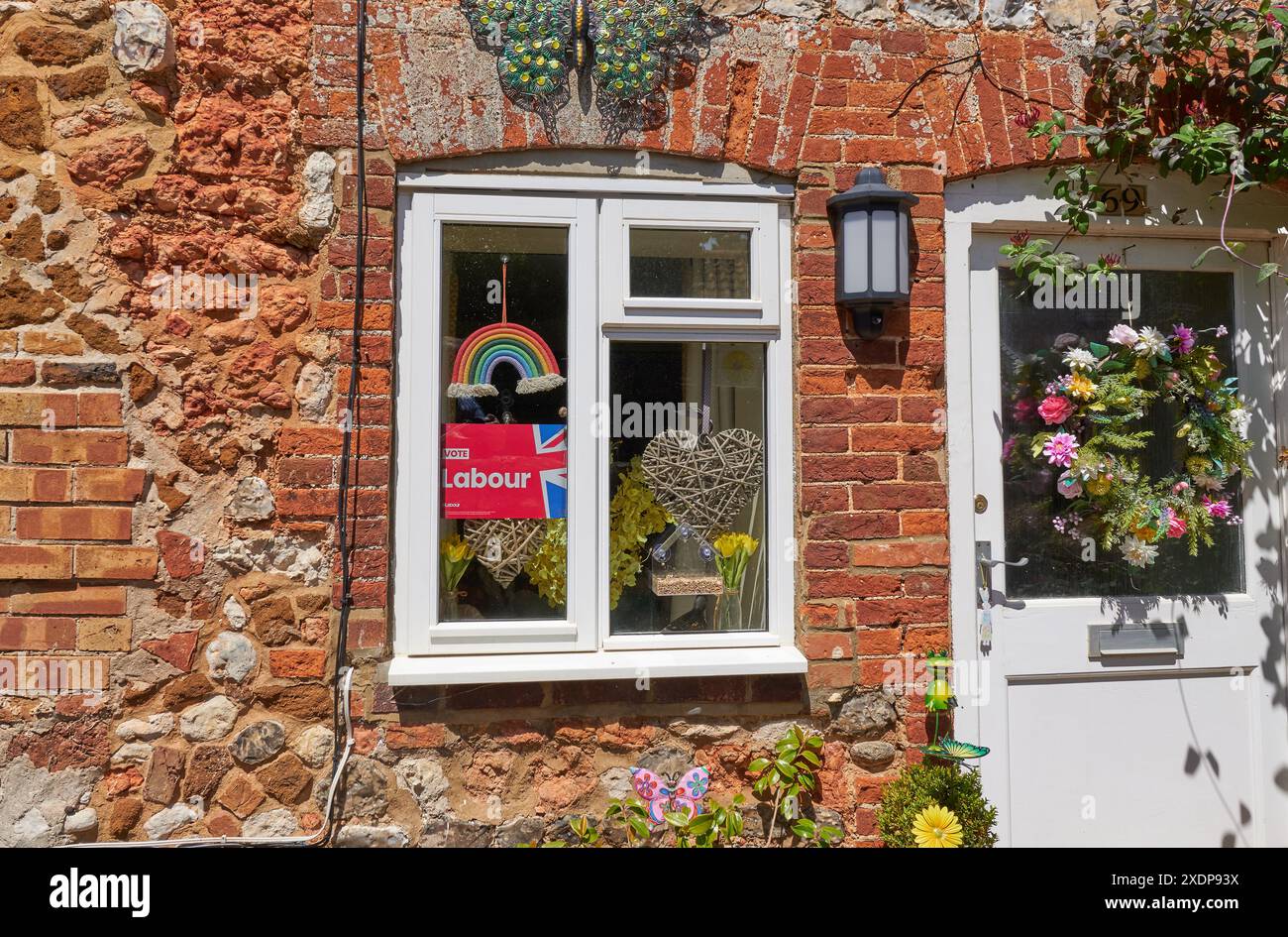 Vote Labour sign in a cottage window Stock Photo - Alamy