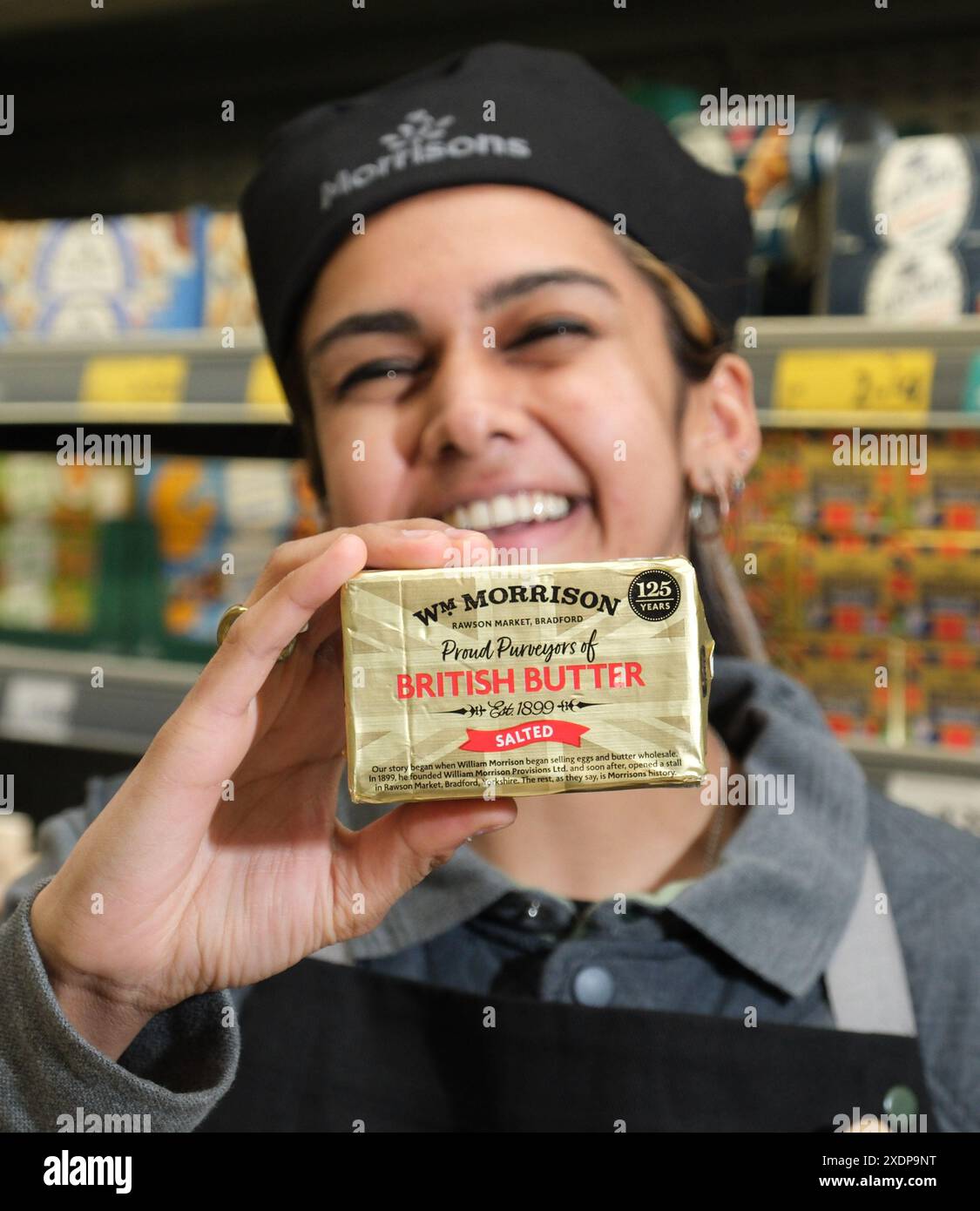 EDITORIAL USE ONLY Customer Assistant Flor unveils Morrison's limited ...