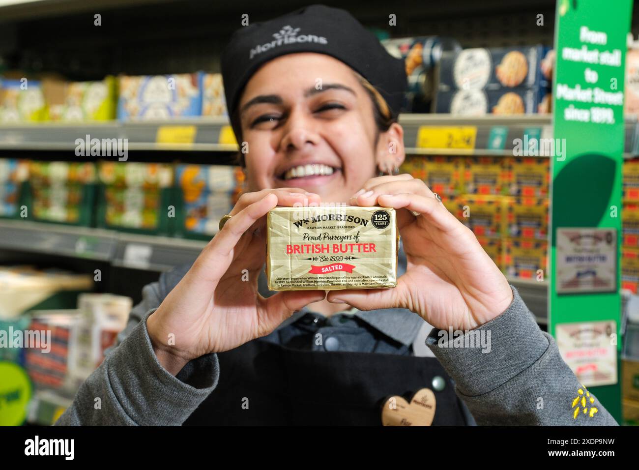 EDITORIAL USE ONLY Customer Assistant Flor unveils Morrison's limited ...