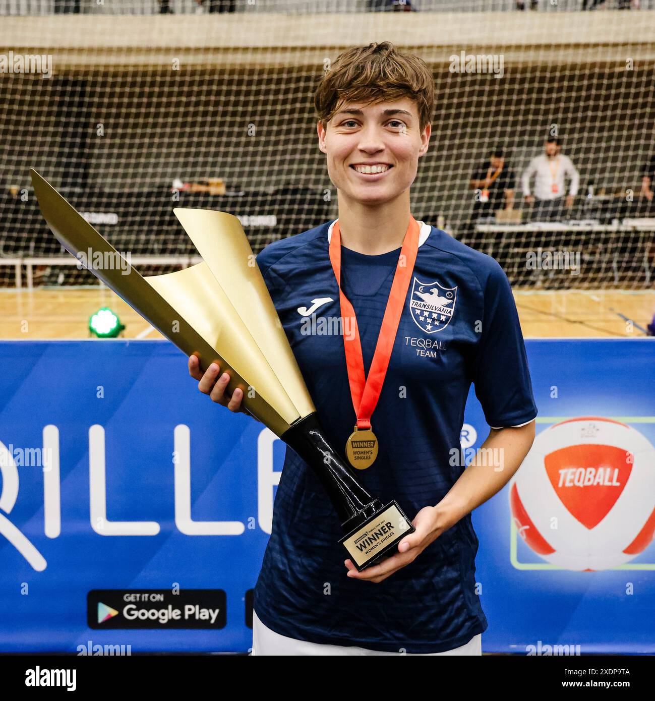 Romanian player Kinga Barabasi presents the trophy at the Teqball Tour ...