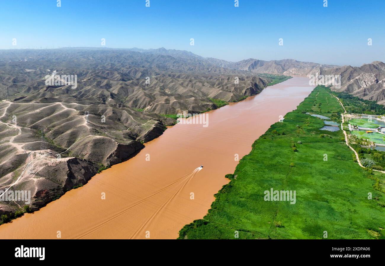 Wuzhong, China. 24th June, 2024. An aerial photo is showing the Yellow ...