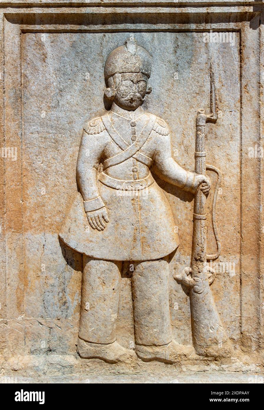 Wall carving of a Persian soldier Stock Photo - Alamy