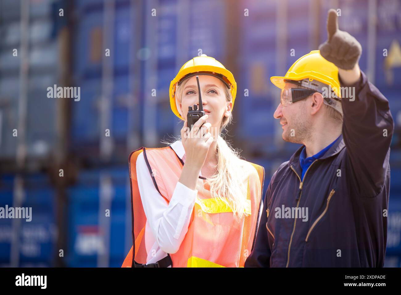 Customs worker team working in Port Cargo Shipping Container Yard together, Radio Loading ...