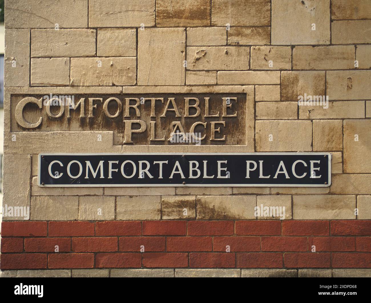 Comfortable Place road name sign carved in Bath stone wall with more ...
