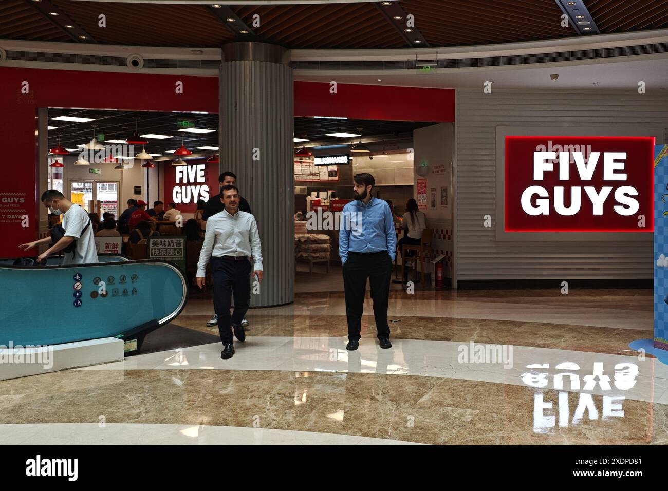 SHANGHAI, CHINA - JUNE 24, 2024 - Tourists eat at the American fast ...