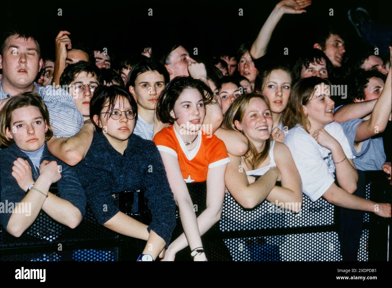 BRITPOP FANS, OASIS, 1996: Young excited Britpop fans in the crowd up ...