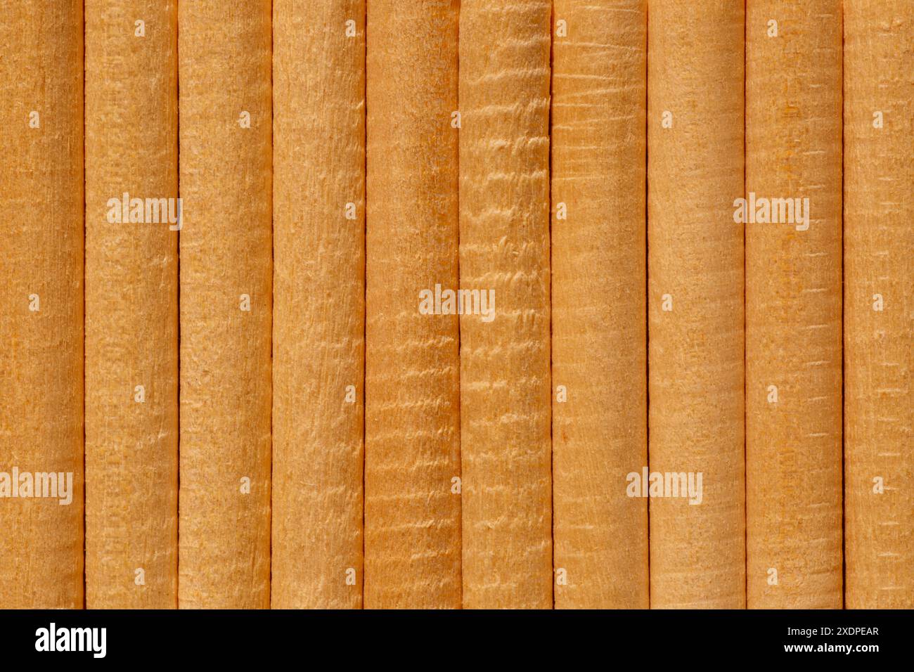 natural backdrop: wall made of vertical logs Stock Photo - Alamy
