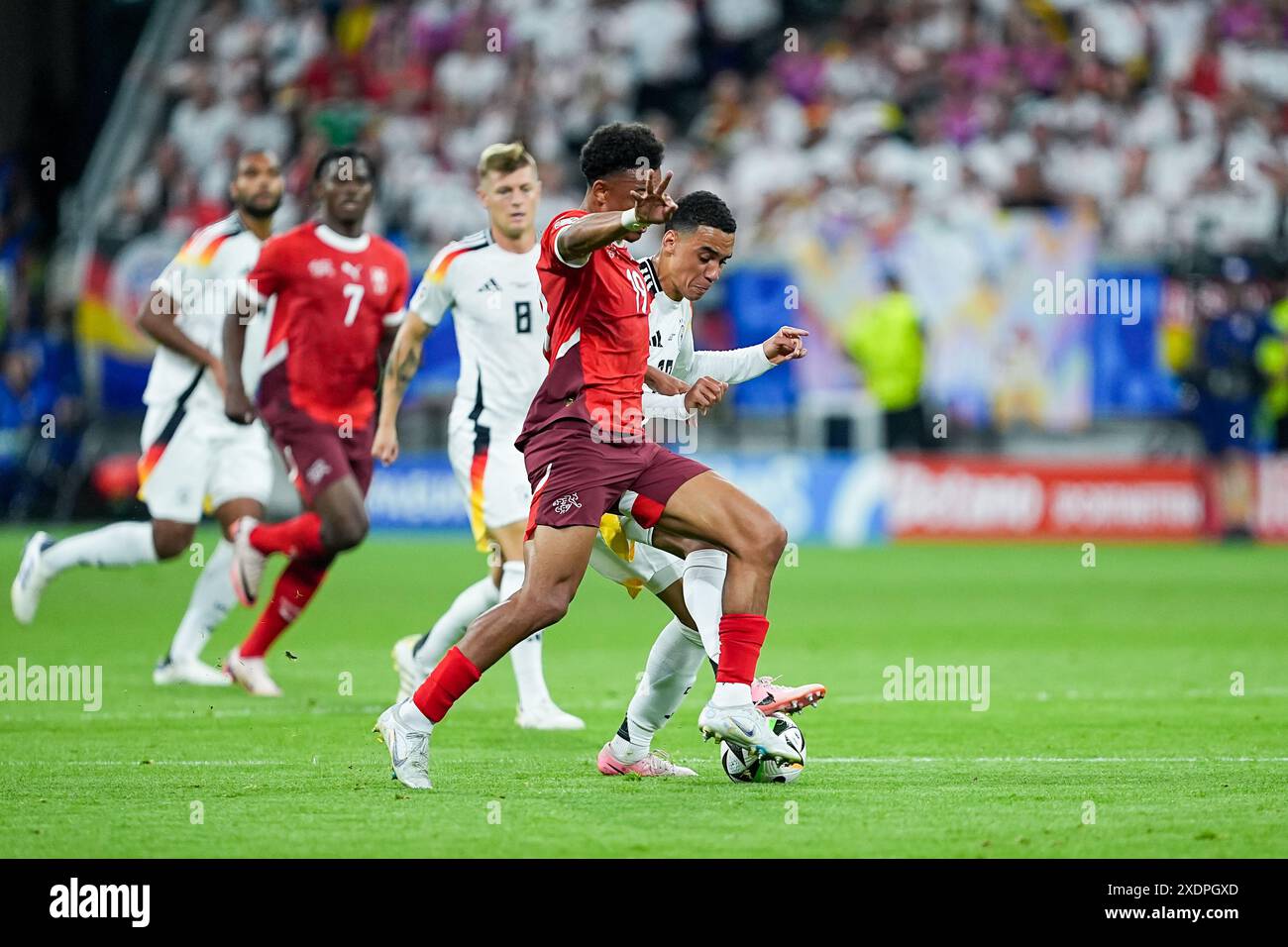 Frankfurt, Germany, June 23th 2024: Dan Ndoye (19 Switzerland) defends ...