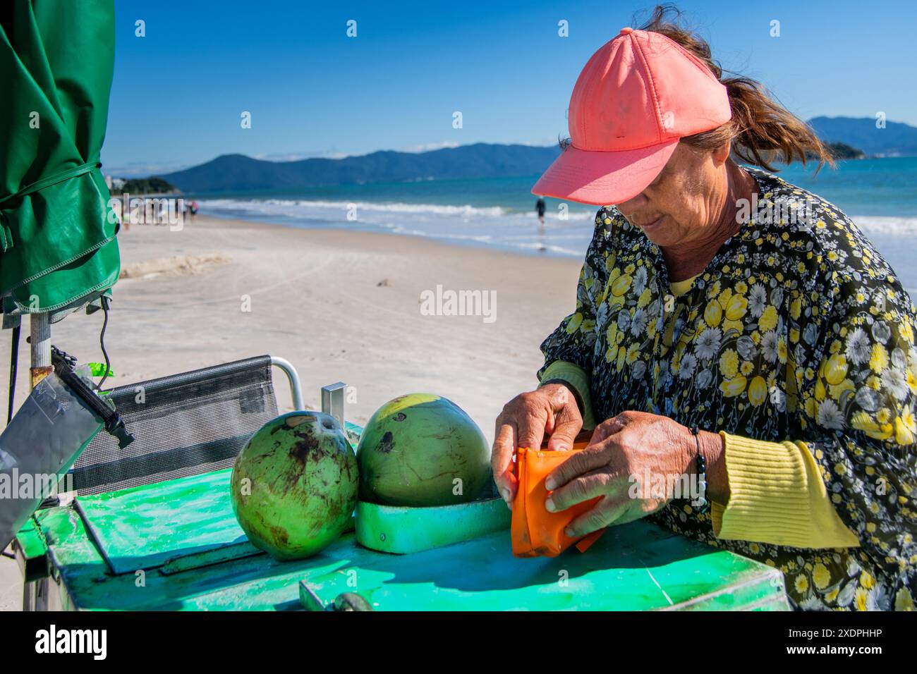 COCONUT Water Vendor on the Beach Stock Photo - Alamy