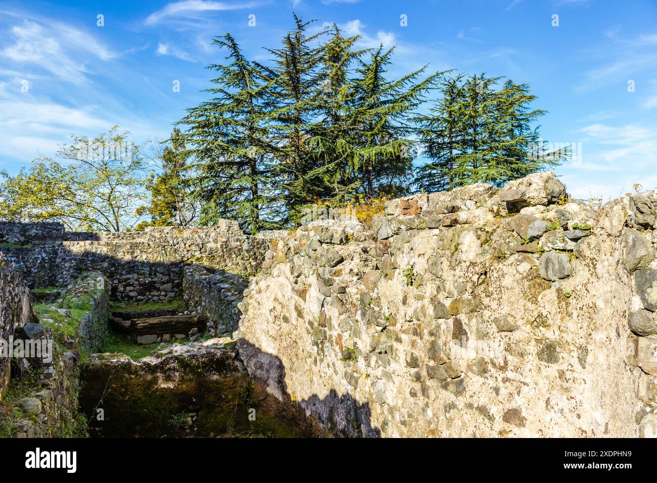 Fragment of an ancient stone wall with an embrasure in the Petra ...