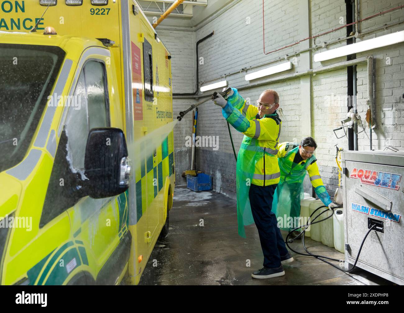 Liberal Democrats leader Sir Ed Davey washes an ambulance during a ...