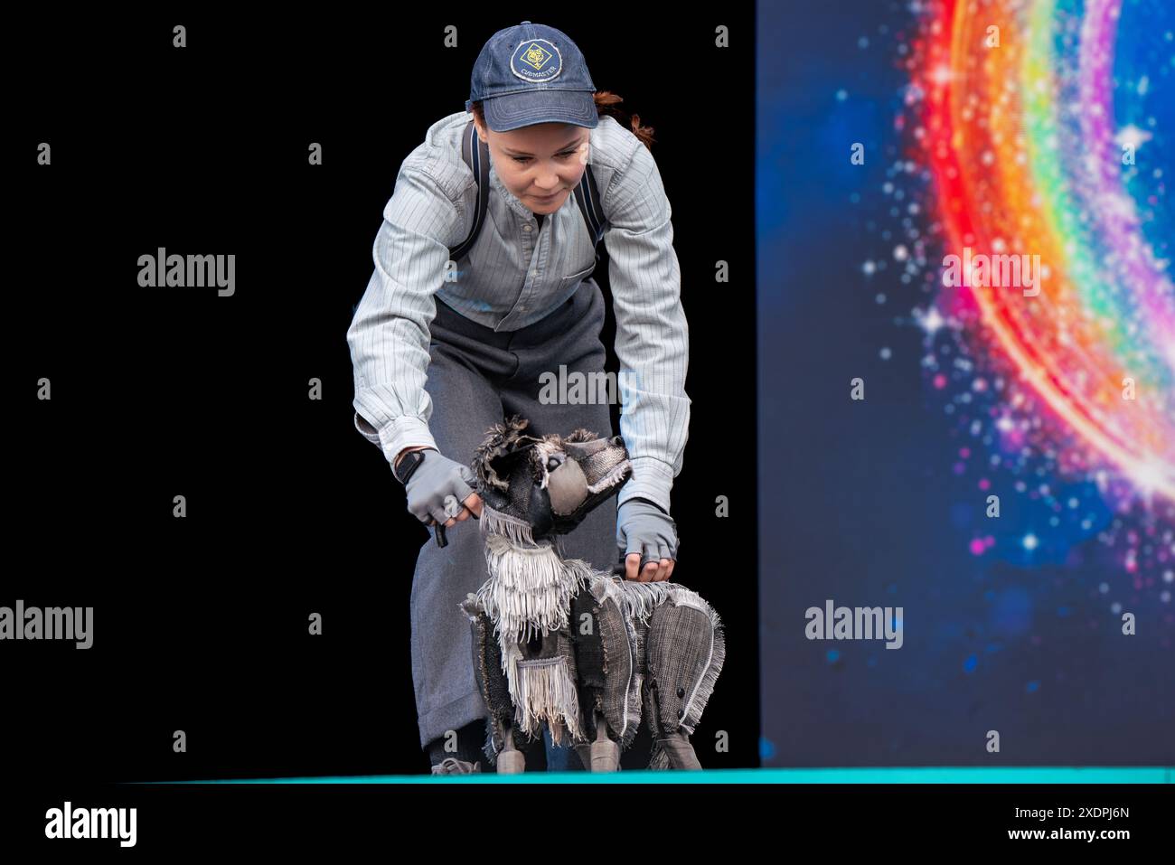 Some of the cast from the production of The Wizard of Oz on stage at ...