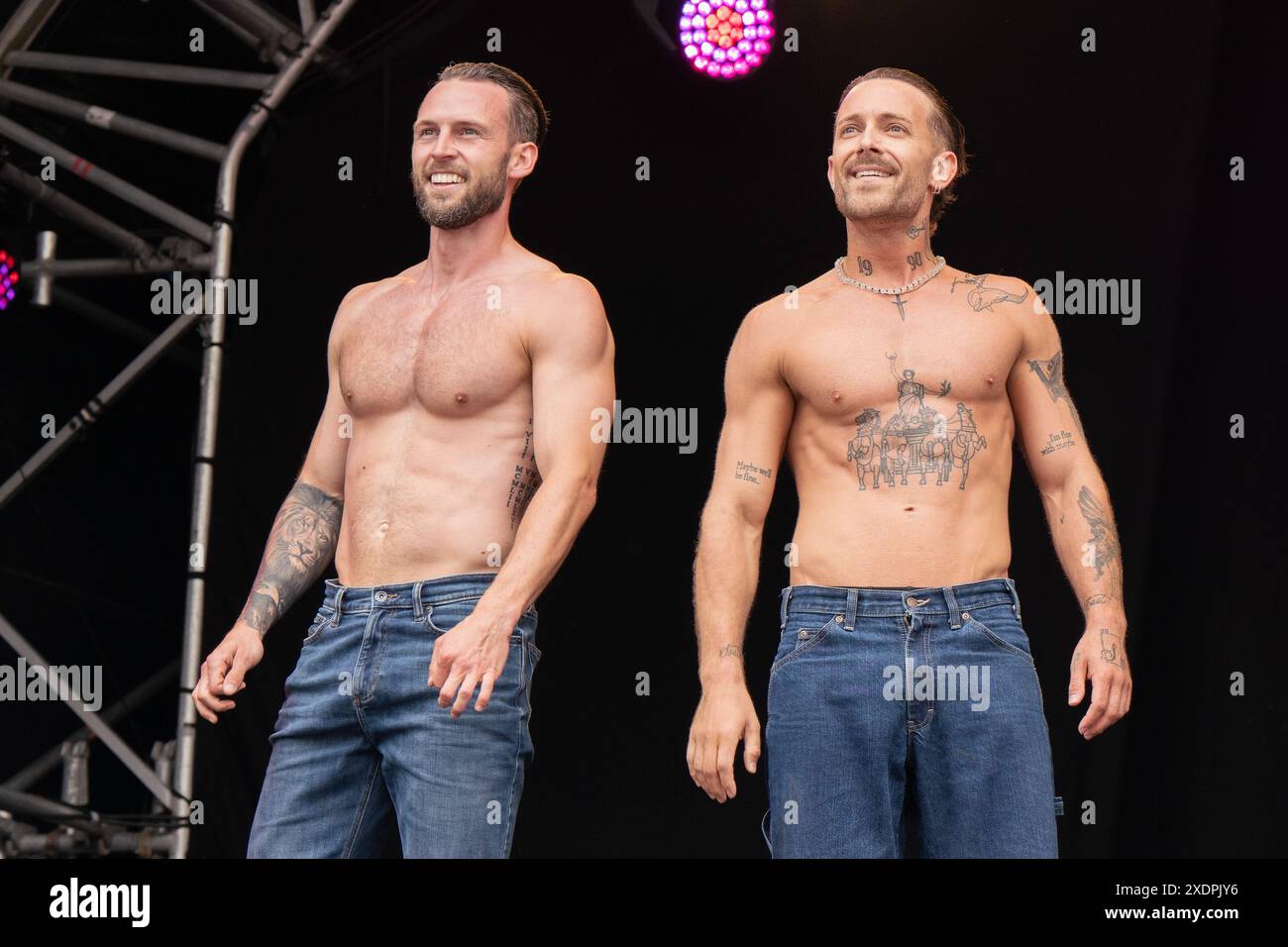 The Cast of Magic Mike Live dance and take their shirts off on stage at ...