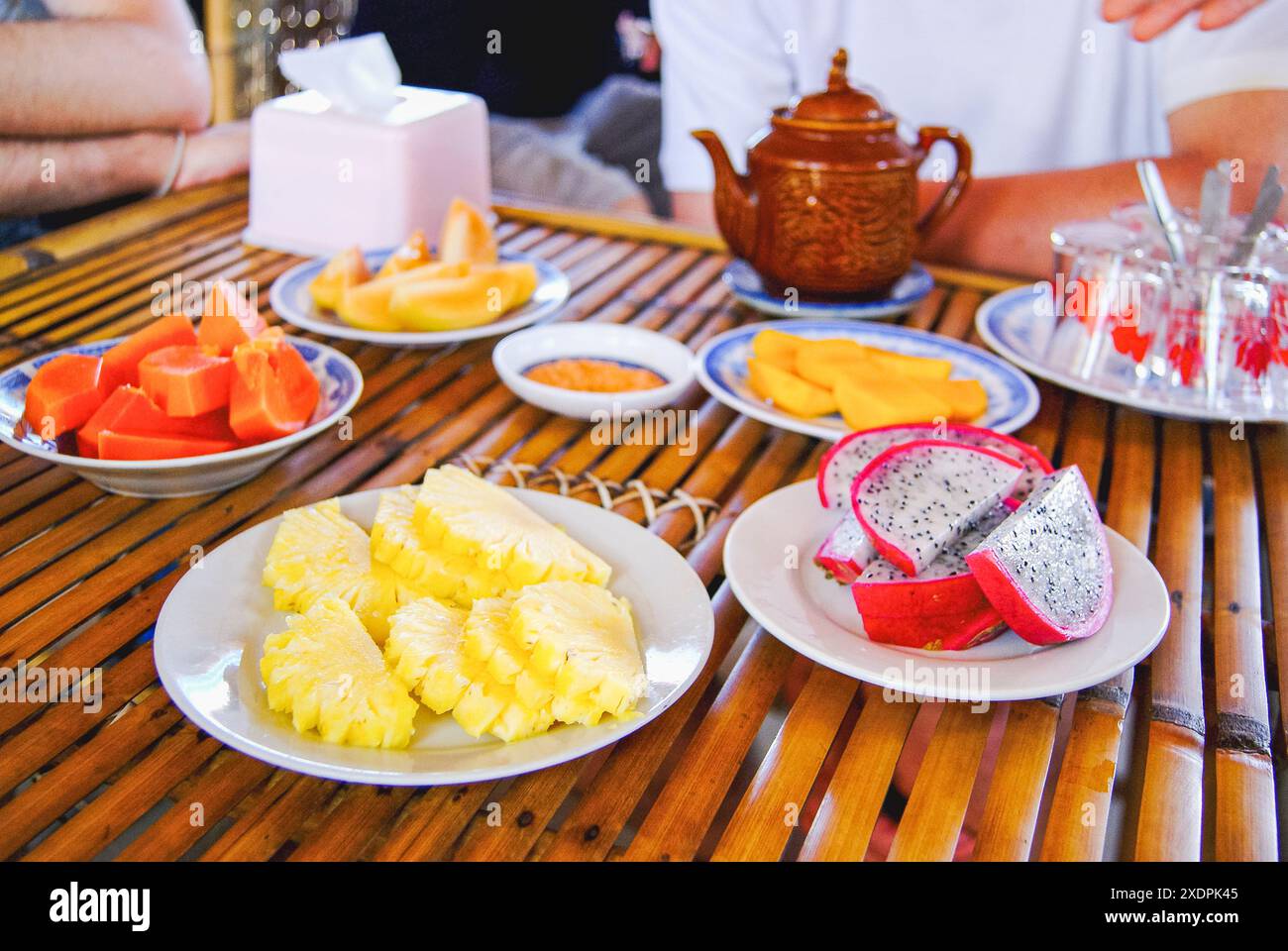 Fresh Fruit Breakfast With Tea in Vietnam Stock Photo - Alamy
