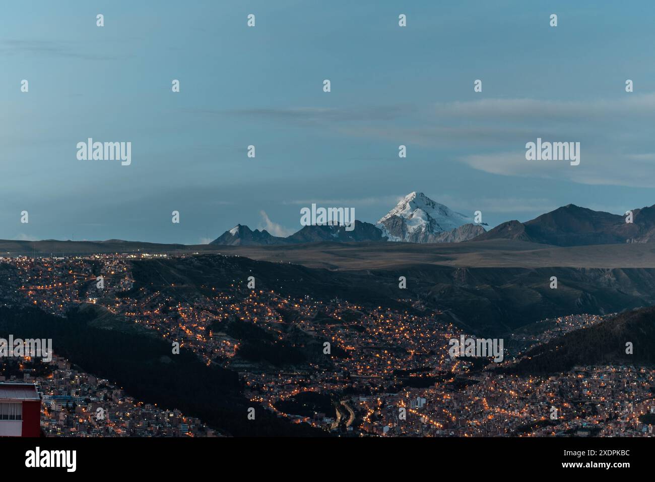 Huayna Potosi snow-capped mountain with the city of La Paz in Bolivia ...
