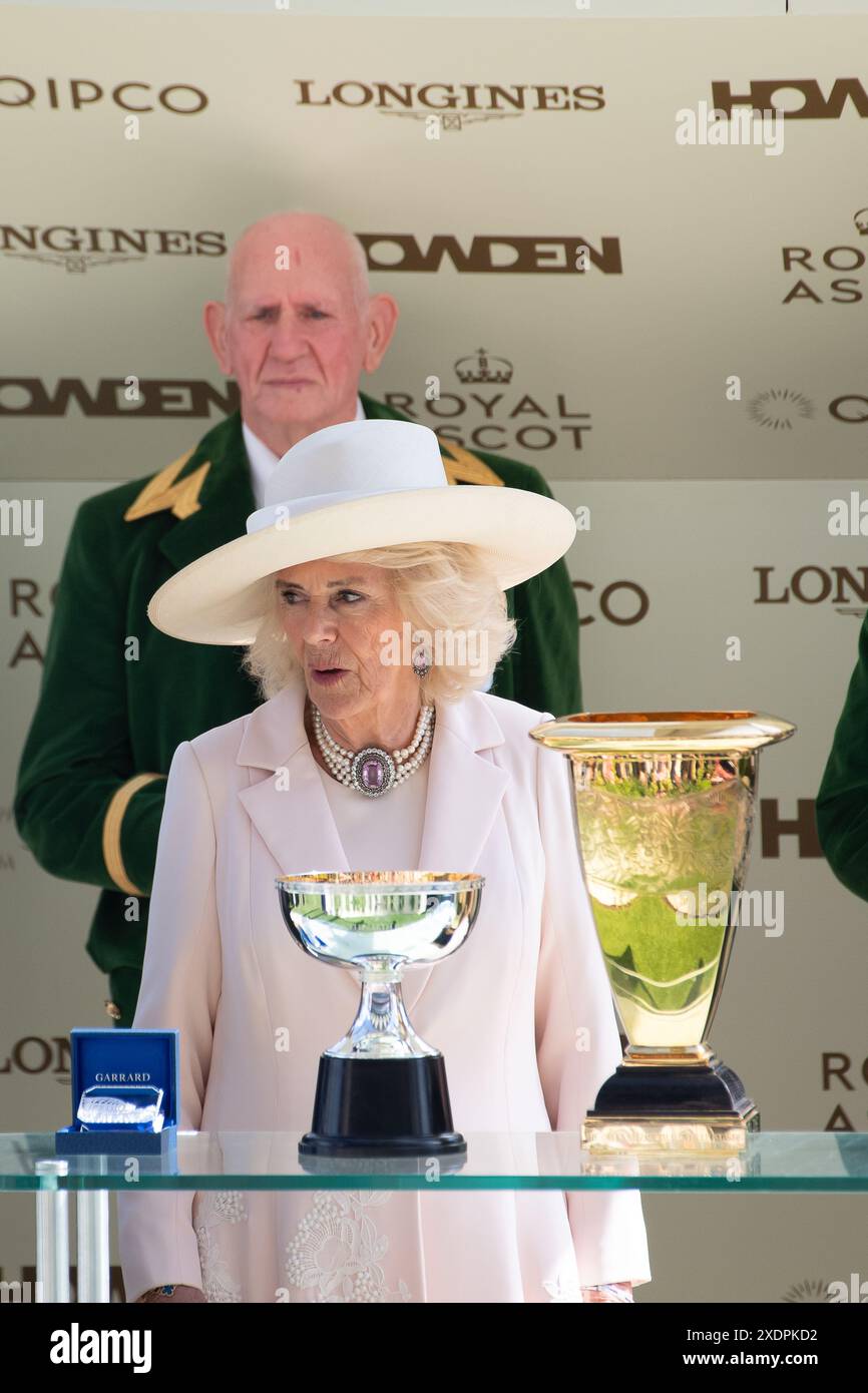 Ascot, UK. 22nd June, 2024. Queen Camilla makes the winners ...