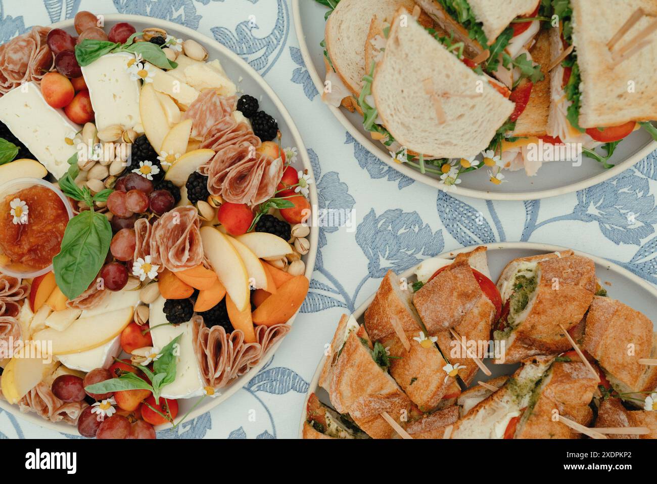 Picnic Charcuterie platter with sandwiches Stock Photo - Alamy
