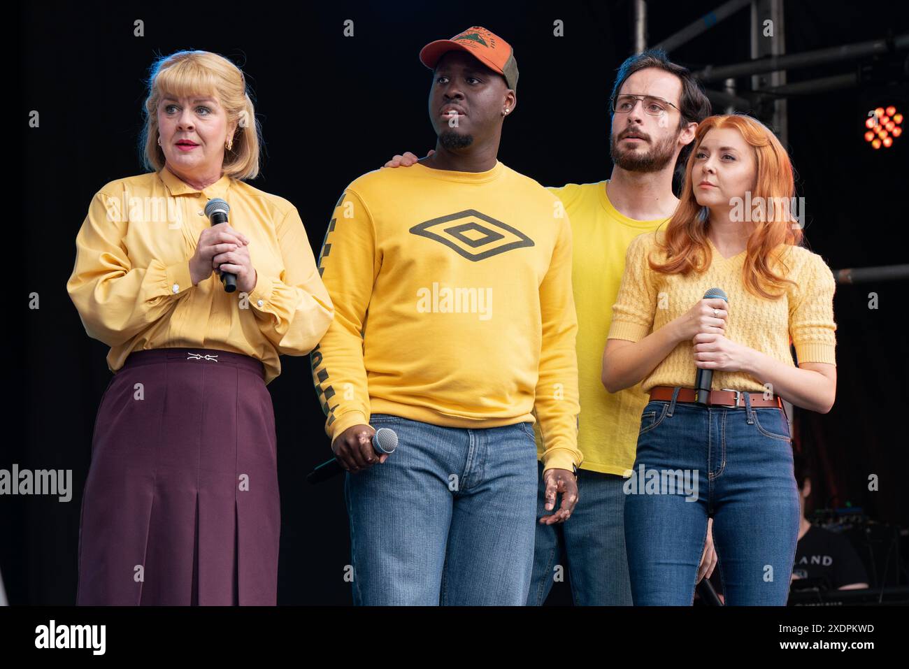 The cast of 42 Balloons perform on stage at West End Live. West End ...