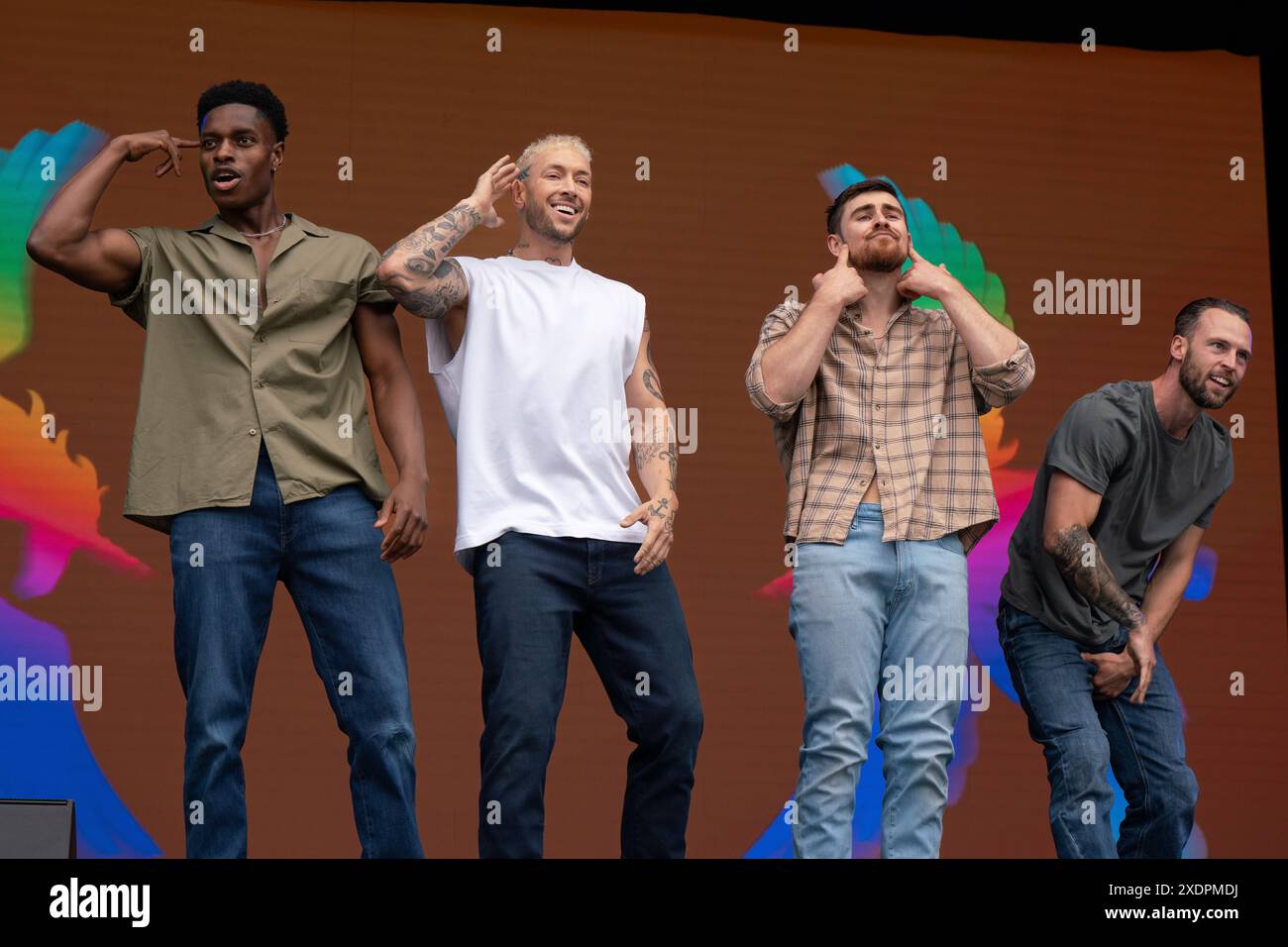 The Cast of Magic Mike Live dance and take their shirts off on stage at ...