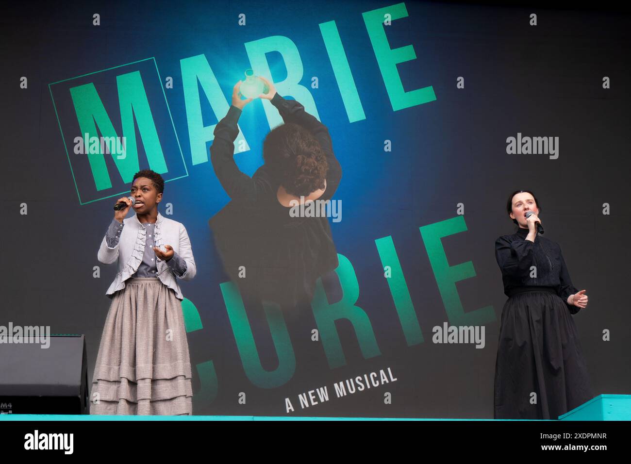The cast of the show Marie Curie on stage at West End Live. West End ...